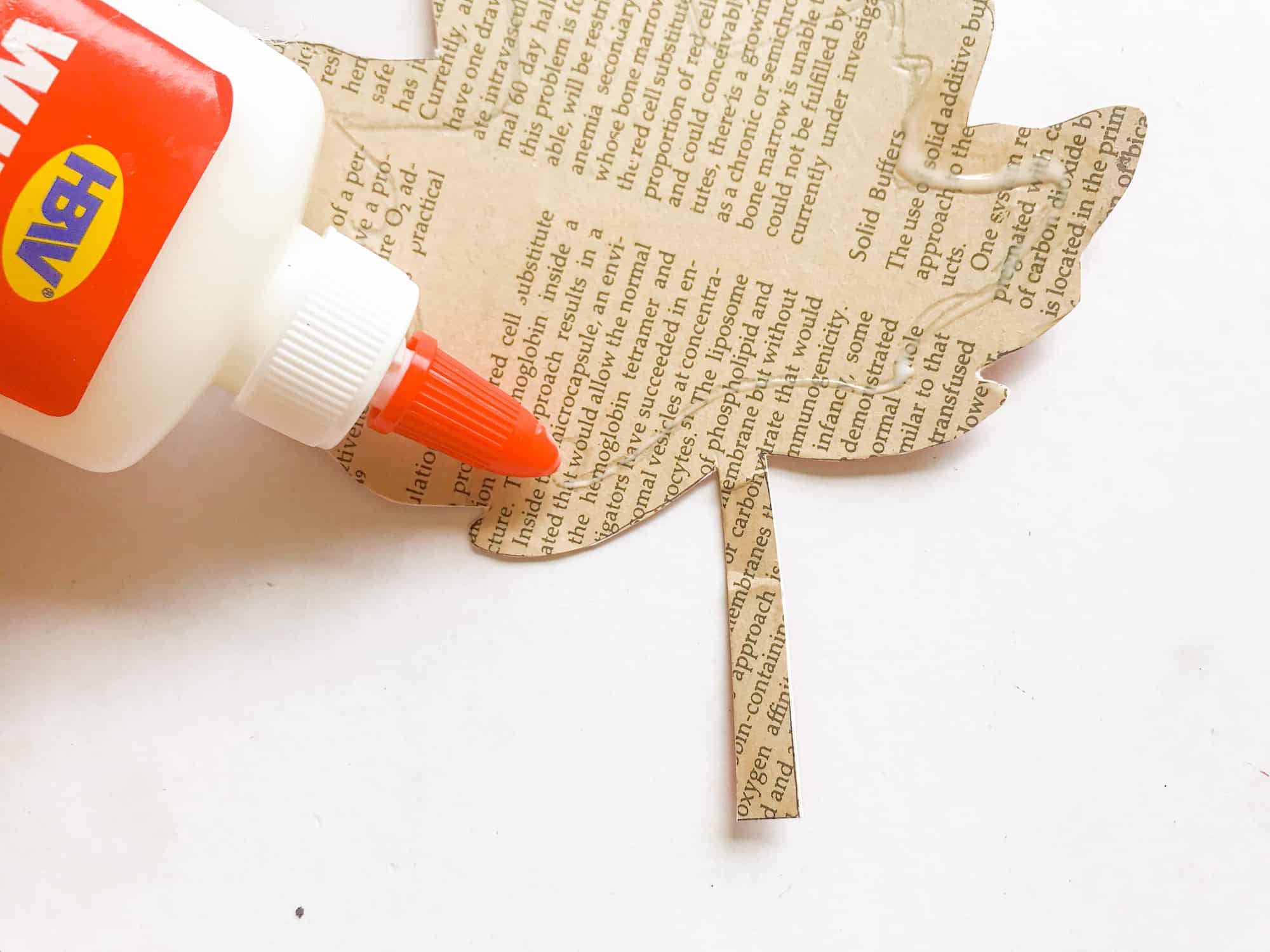 How to Make Glittery Book Page Leaves - Single Girl's DIY