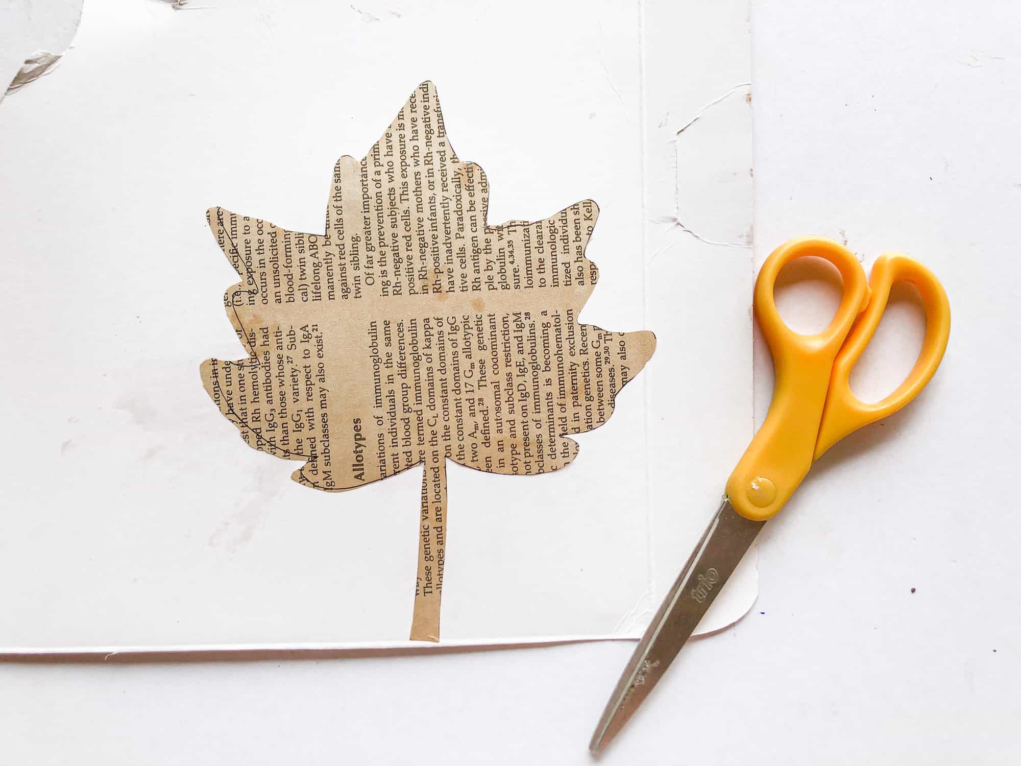 How to Make Glittery Book Page Leaves - Single Girl's DIY