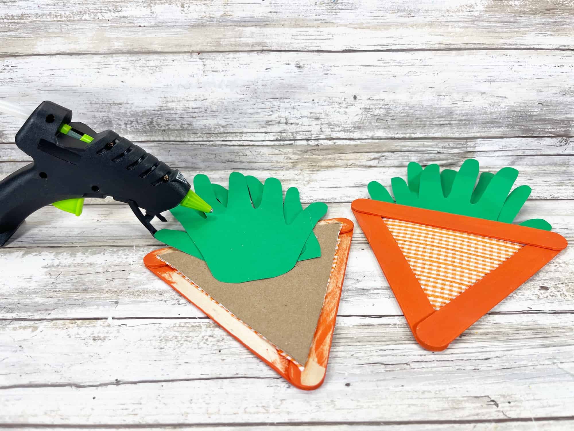 Handprint Carrot Craft with Popsicle Sticks - Single Girl's DIY